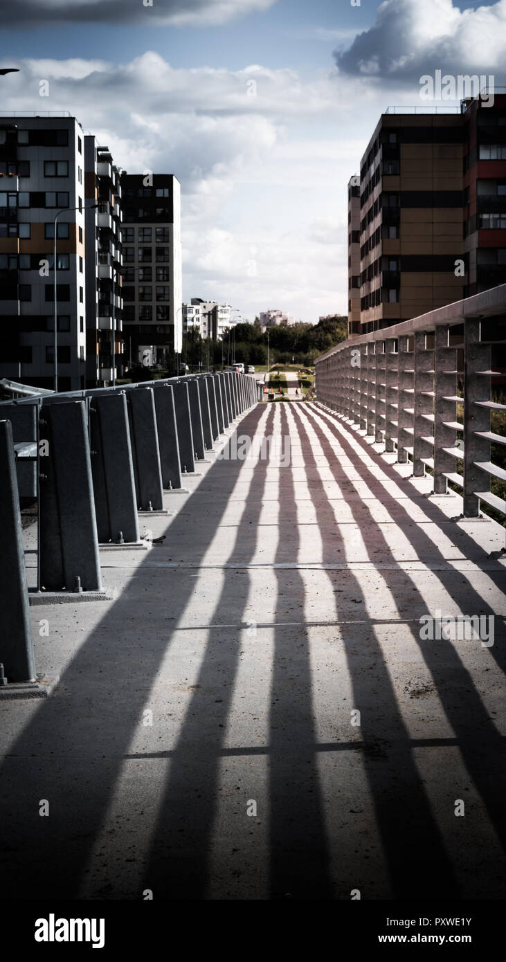 Railing shadow on a bridge Stock Photo - Alamy