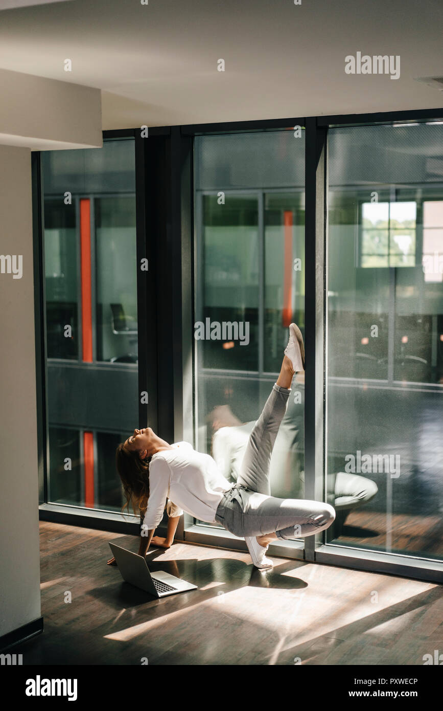 Woman dancing laptop in hi-res stock photography and images - Alamy