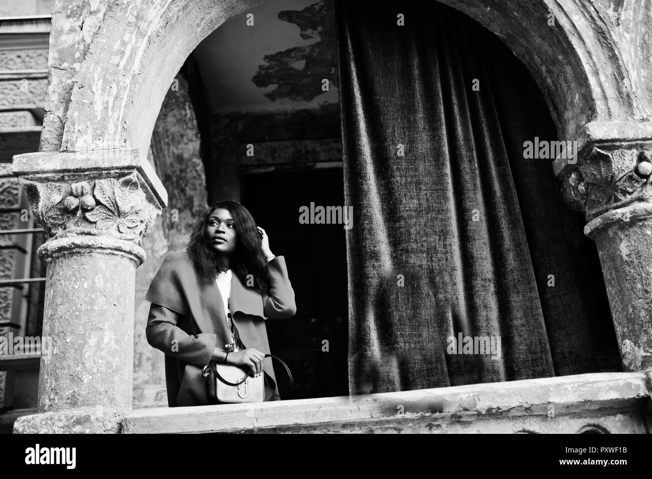 Person in red coat Black and White Stock Photos & Images - Alamy