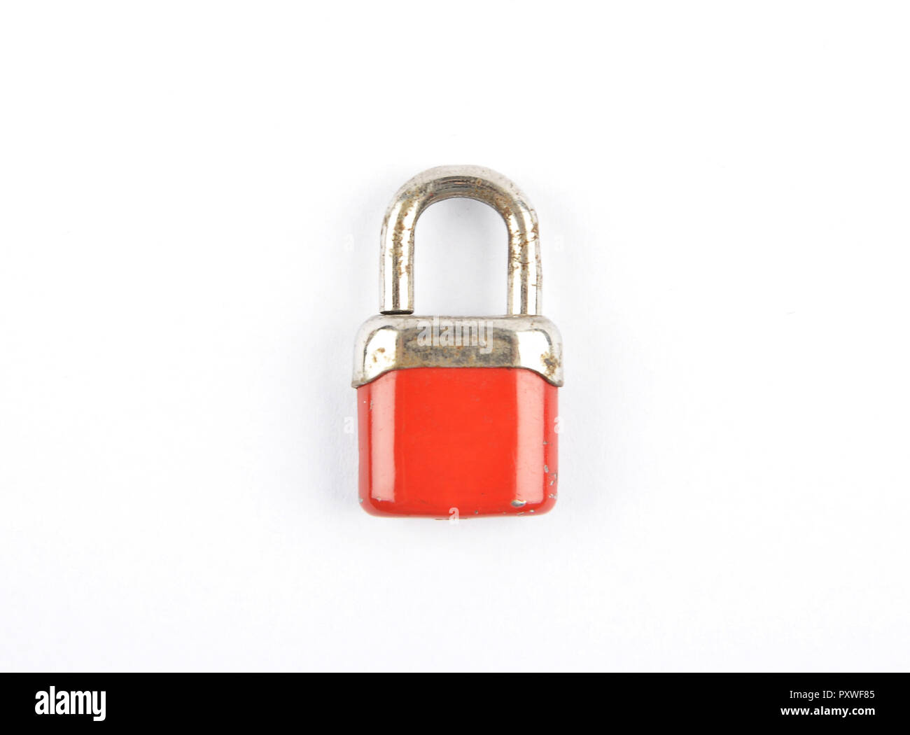 Small padlock on white background Stock Photo - Alamy