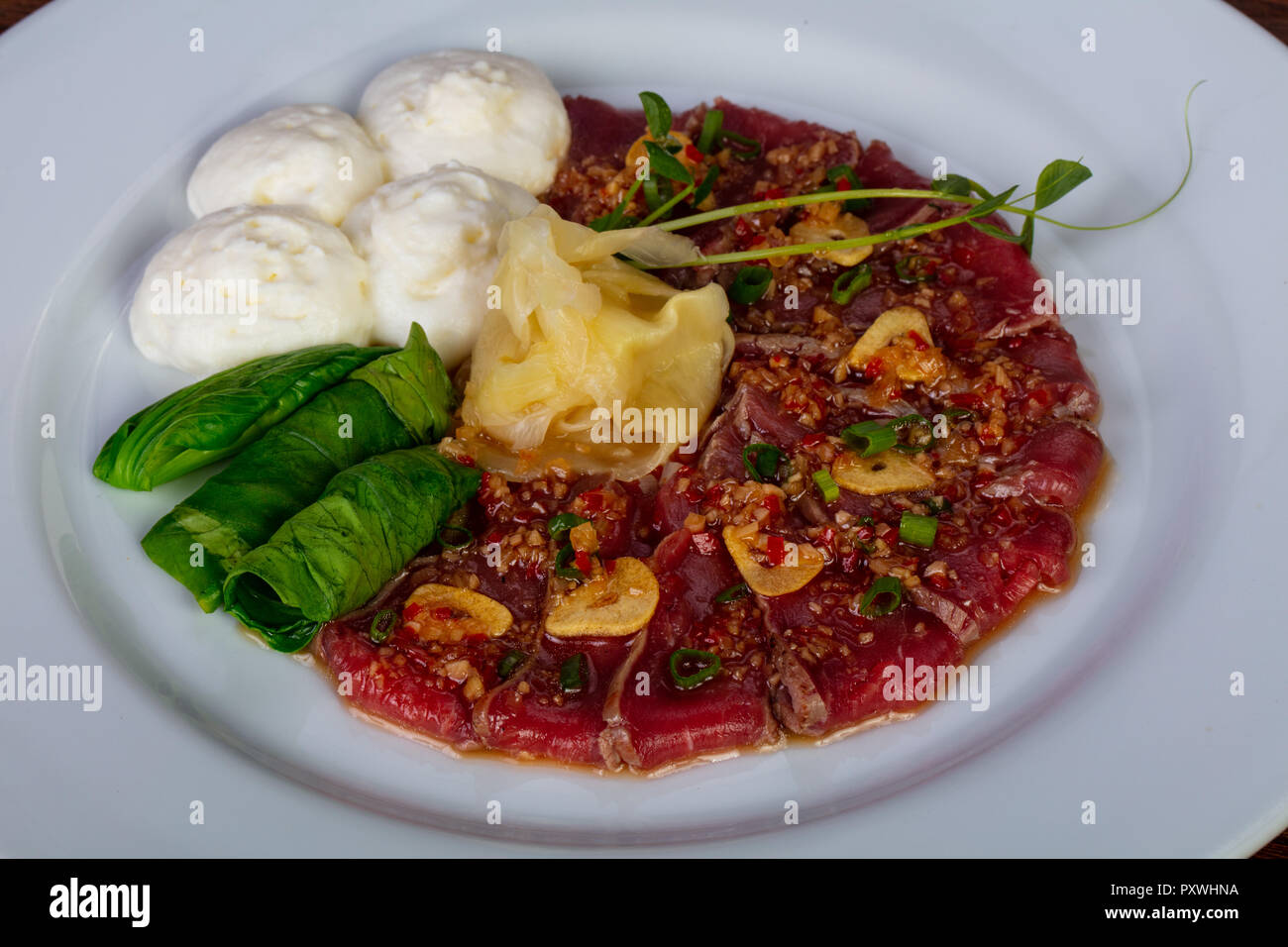 Raw Japanese young Beef carpaccio Stock Photo - Alamy