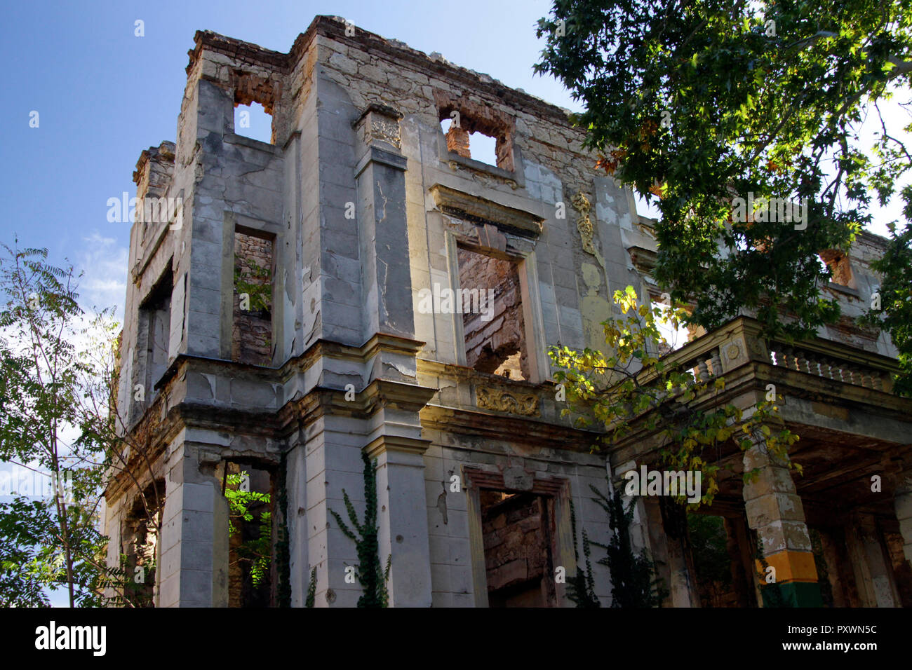 Ruin in the city of Mostar, Bosnia and Herzegovina, with visible bullet ...