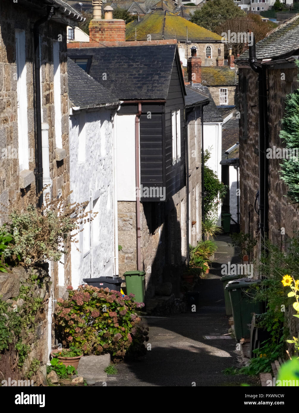 View from above of a very narrow street of terraced traditional village ...