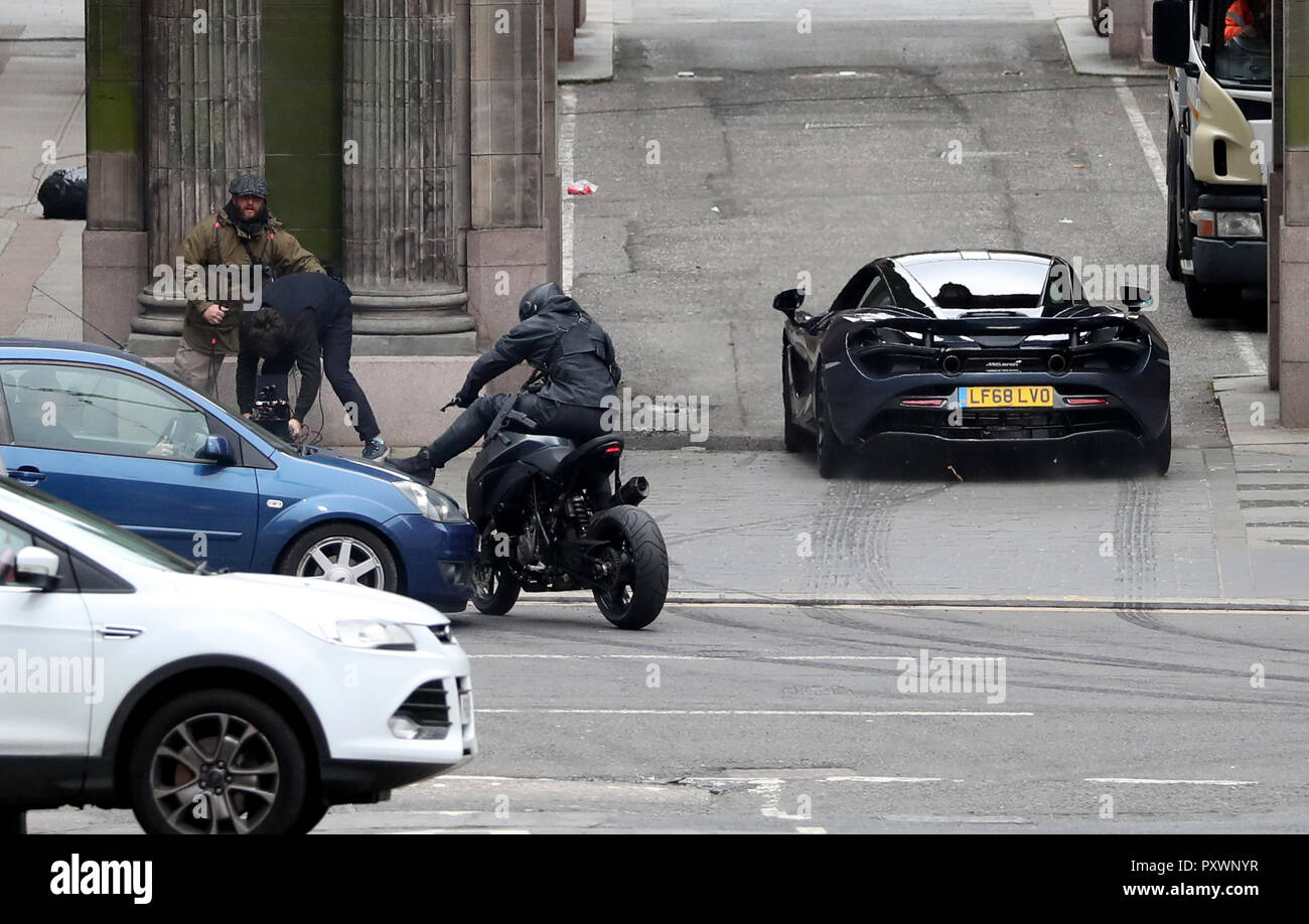 Filming for a car chase scene involving a McLaren sports car and ...