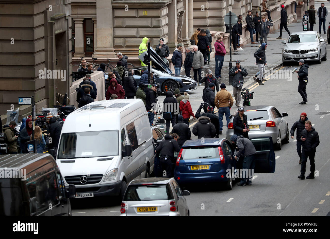 Filming for a car chase scene involving a McLaren sports car and ...