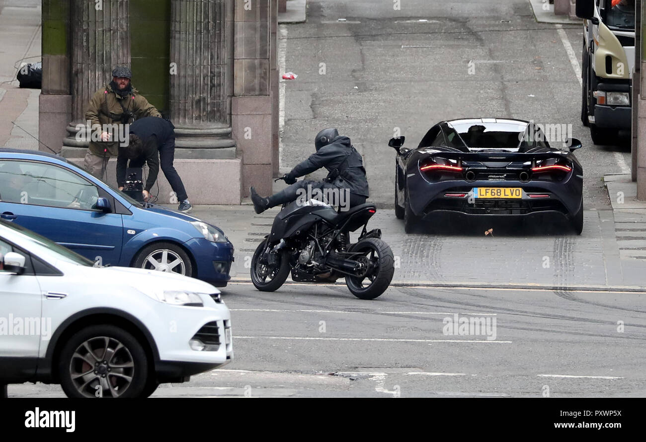 Filming for a car chase scene involving a McLaren sports car and ...
