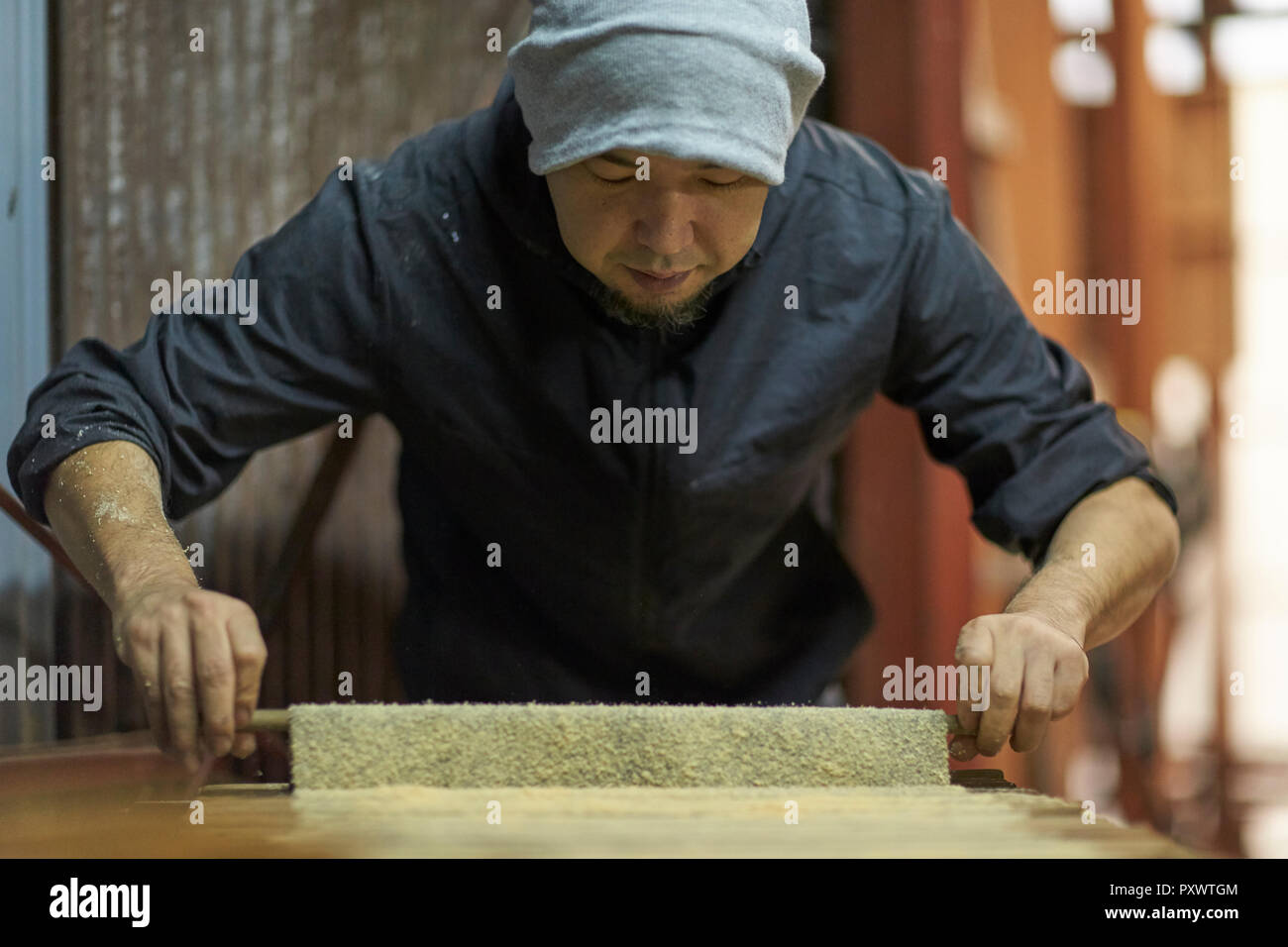Japanese artisan working in the studio Stock Photo - Alamy