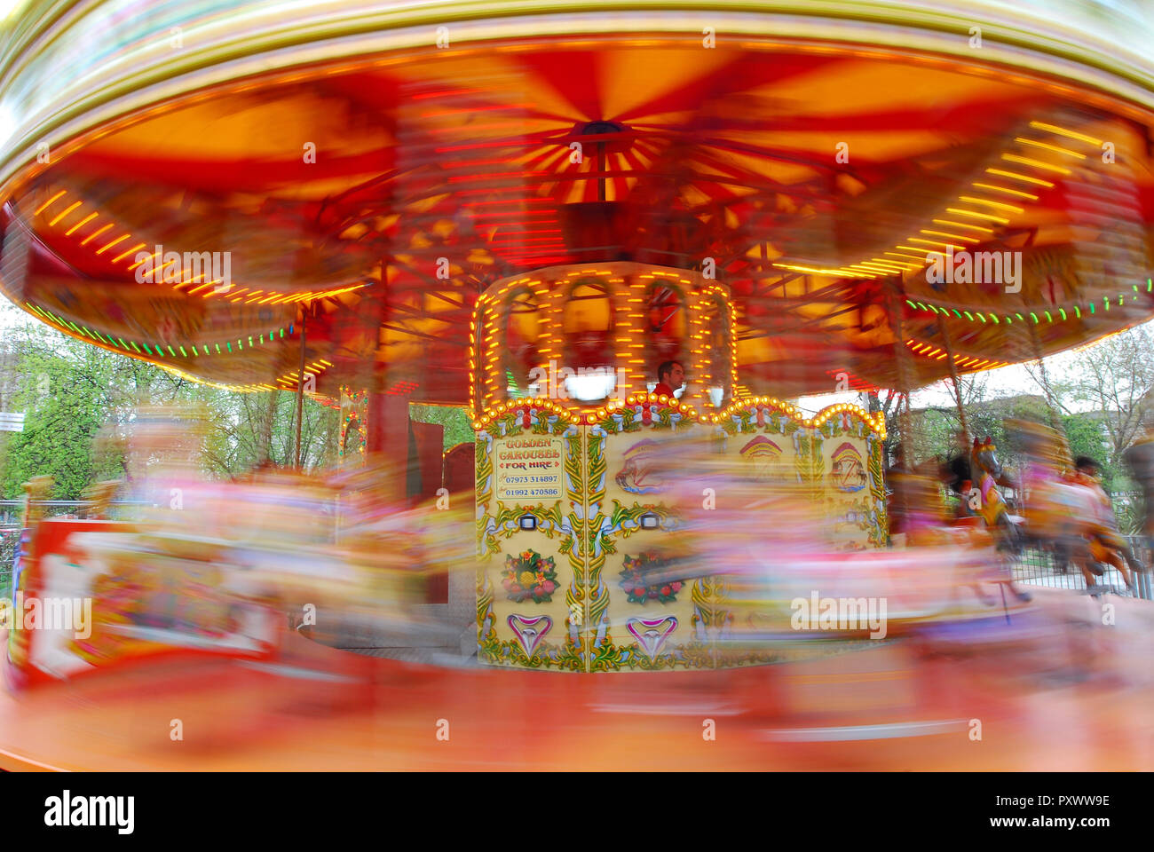 Animated merry-go-round and carousel in London Stock Photo - Alamy