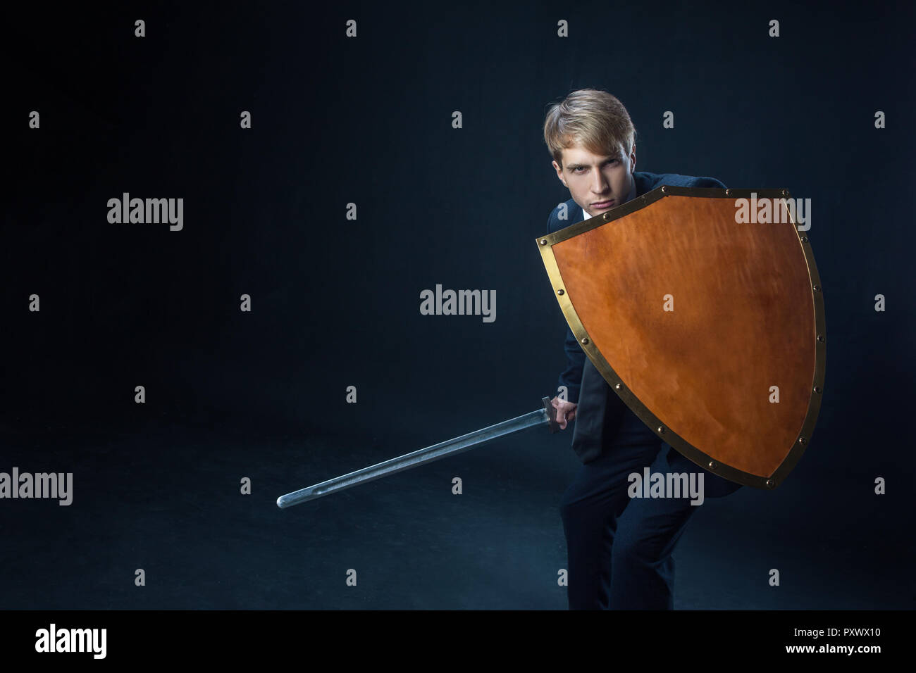 Businessman with sword hi-res stock photography and images - Alamy