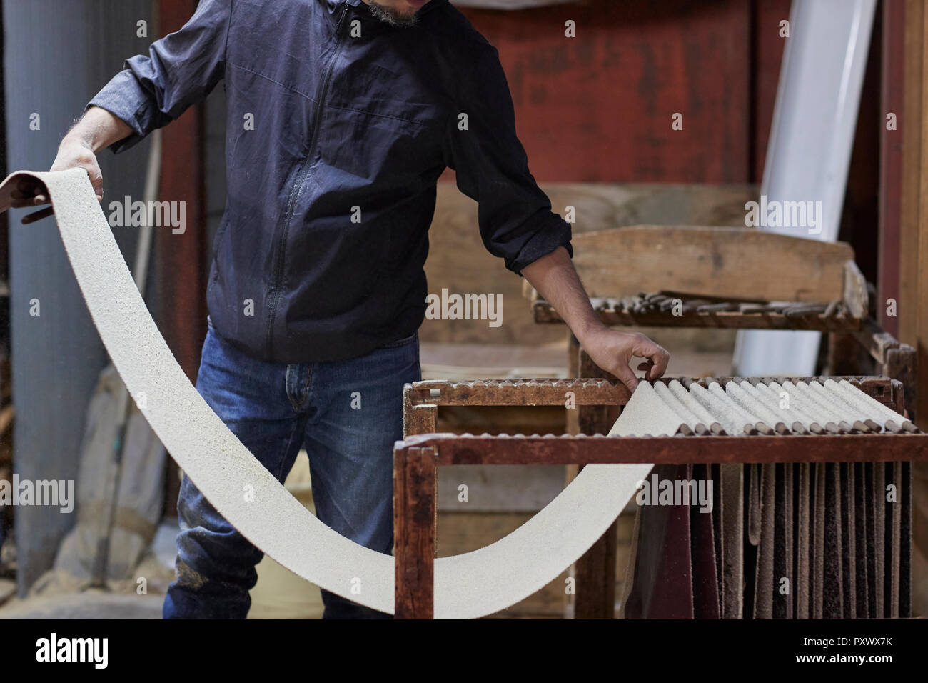 Japanese artisan working in the studio Stock Photo - Alamy
