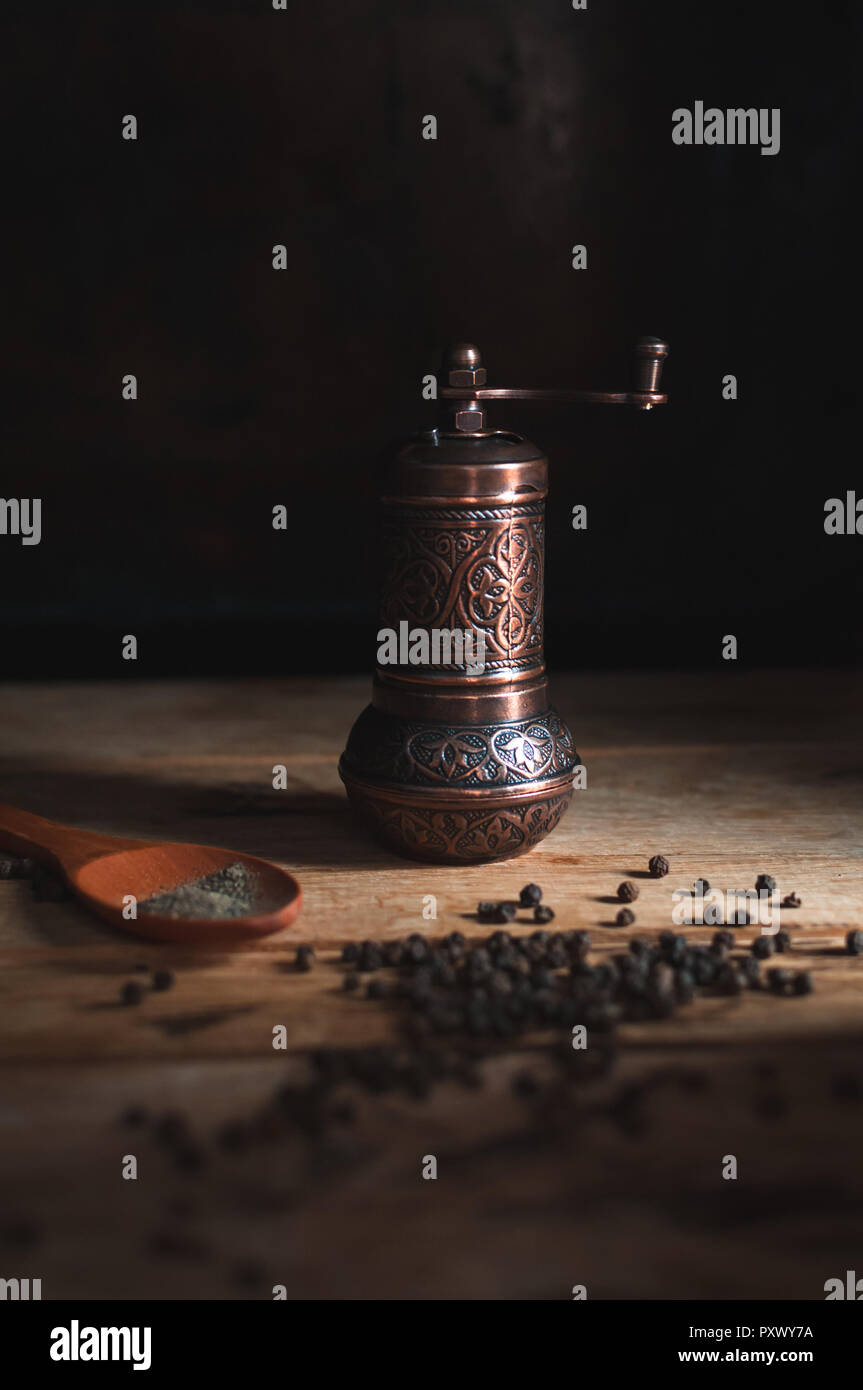 Vintage pepper mill on black hi-res stock photography and images - Alamy