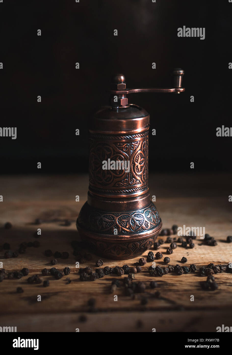 Vintage pepper mill on black hi-res stock photography and images - Alamy