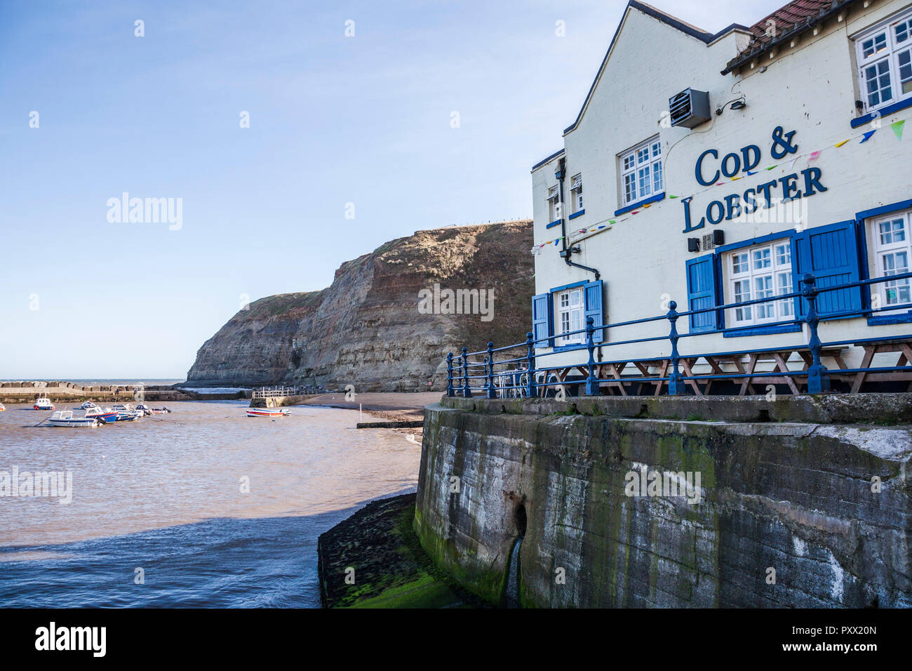 The Cod and Lobster pub and harbour at Staithes,North Yorkshire,England ...