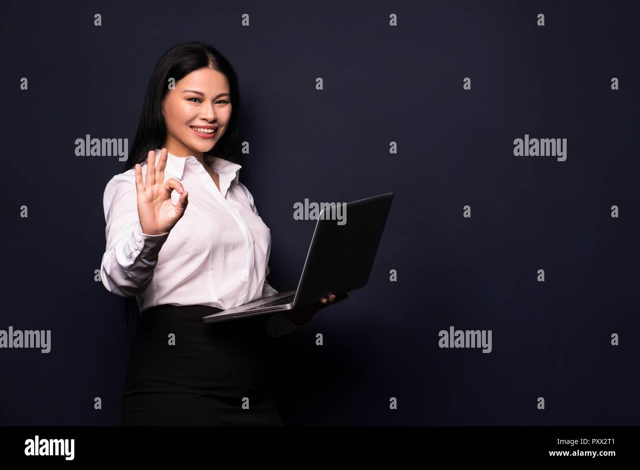 Woman laptop office fashion hi-res stock photography and images - Alamy