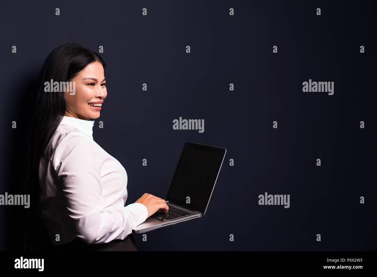 Woman laptop office fashion hi-res stock photography and images - Alamy
