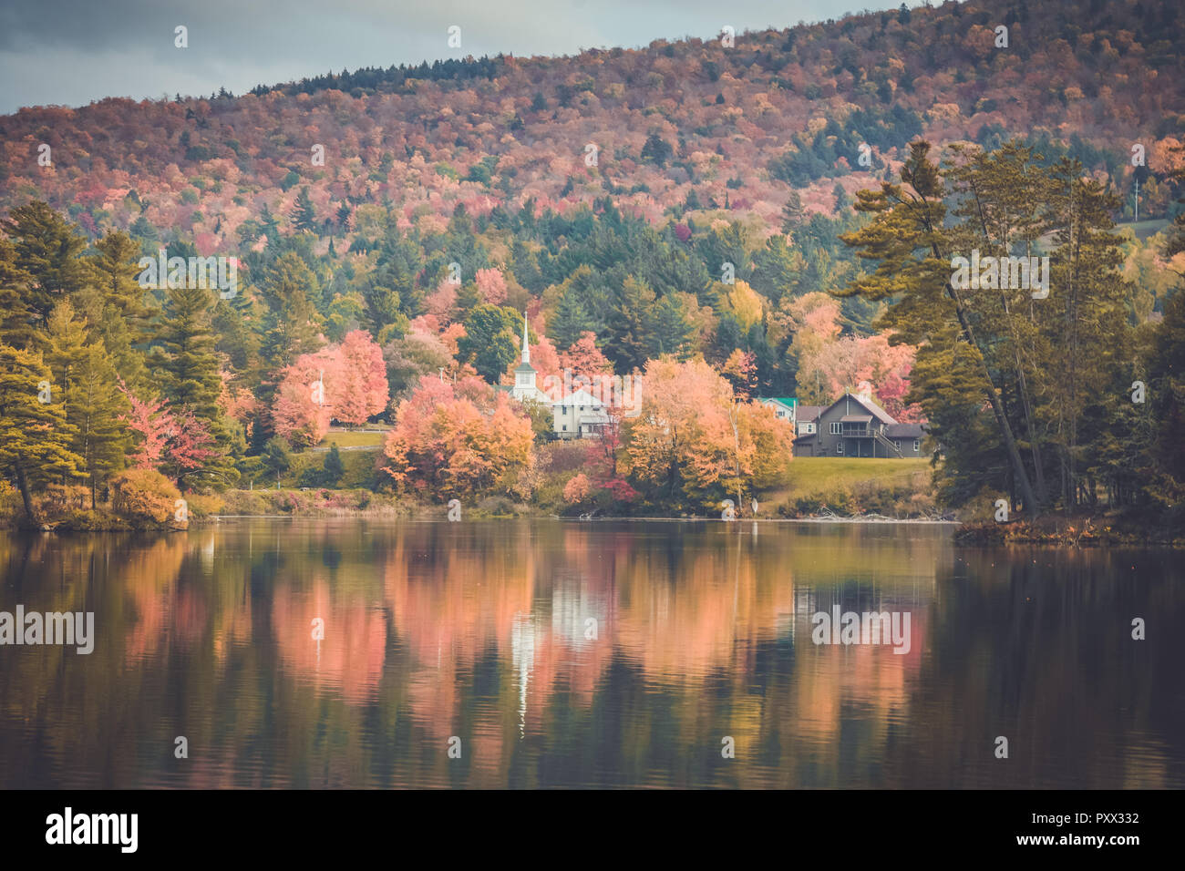 Long Lake, Adirondacks, NY, in the fall surrounded by brilliant ...