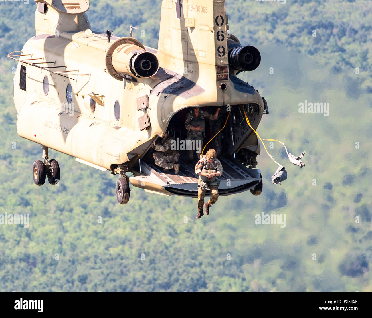Soldier jumping out of a Chinook at Leapfest 2018, an international ...