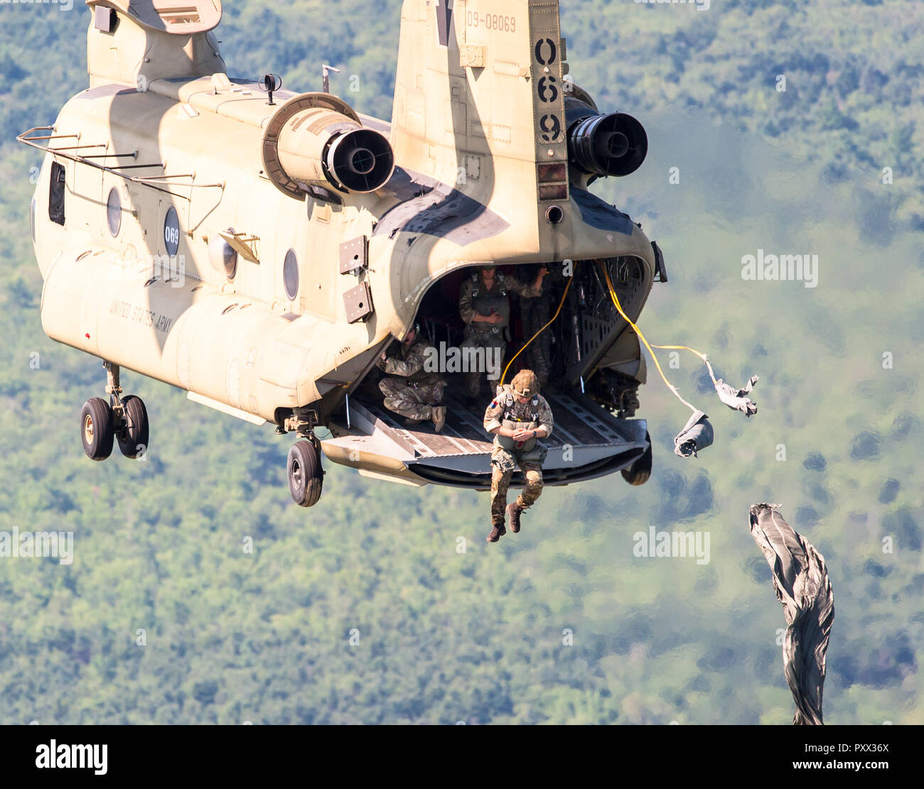 Soldier jumping out of a Chinook at Leapfest 2018, an international ...