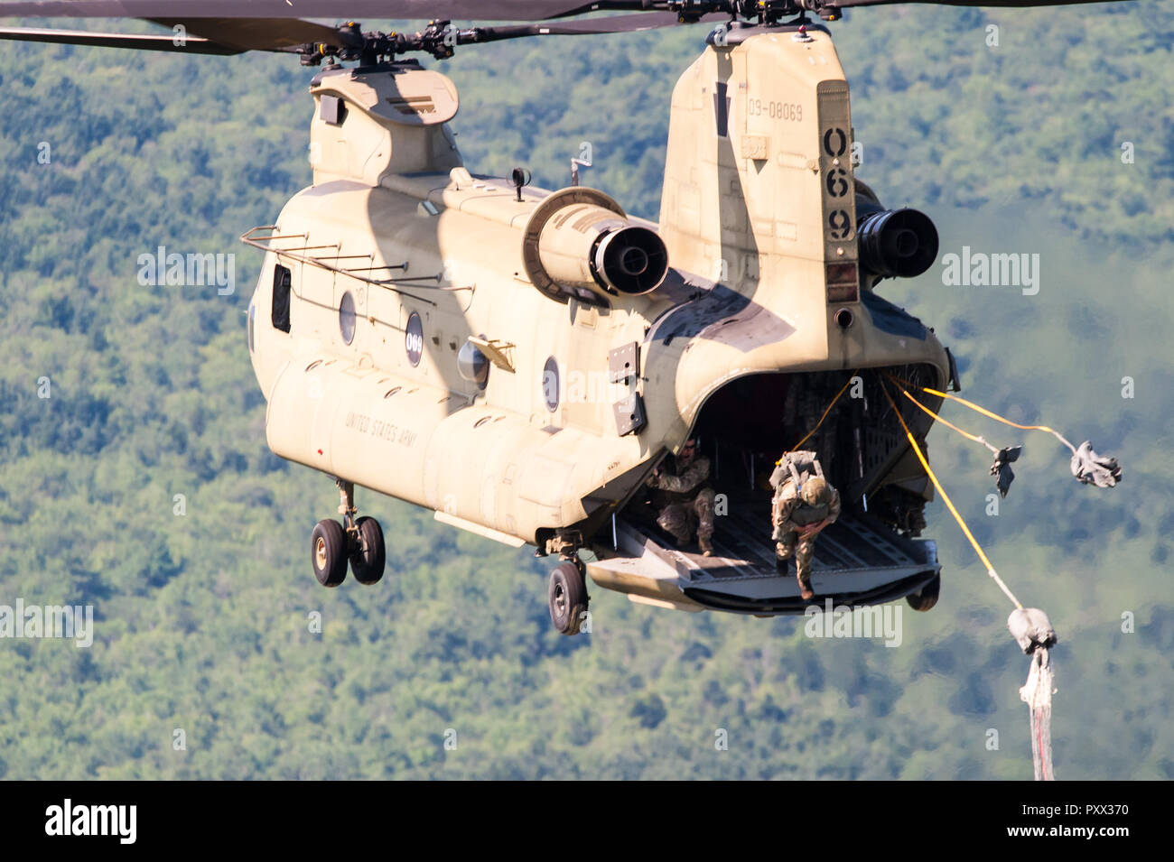 Soldier jumping out of a Chinook at Leapfest 2018, an international ...