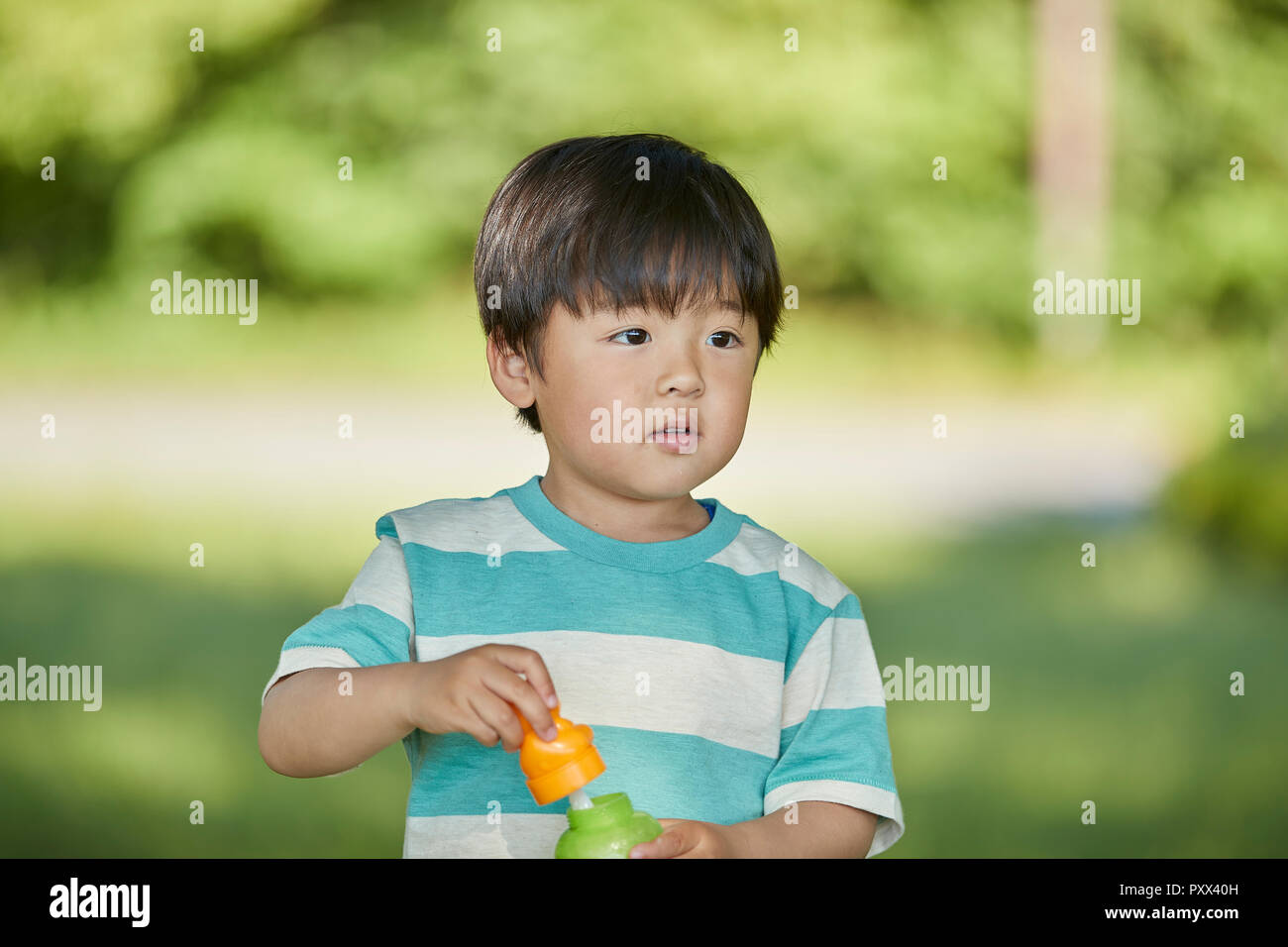 Japanese kid at the park Stock Photo - Alamy