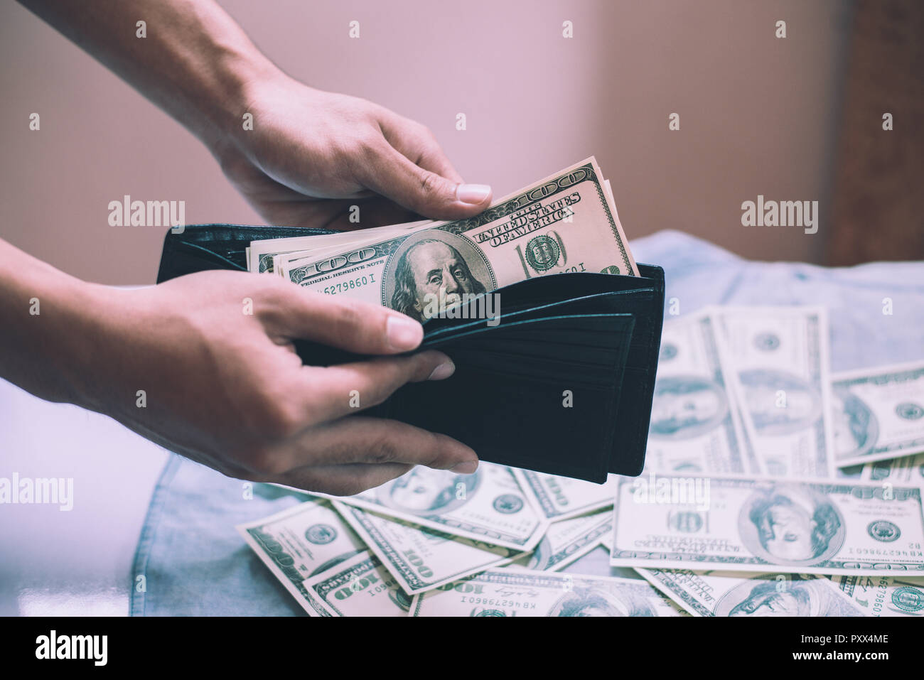 Businessman wallet dollar bills hi-res stock photography and images - Alamy