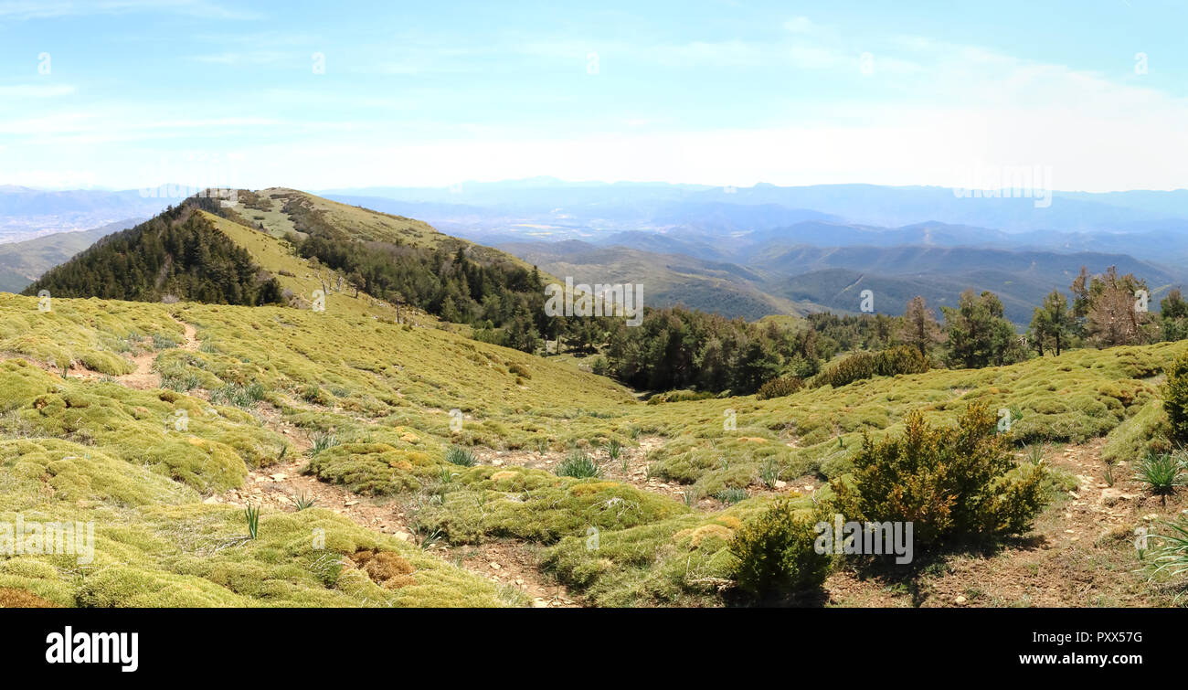 A landscape of a path on the edge of Peña Oroel mount, with the ...