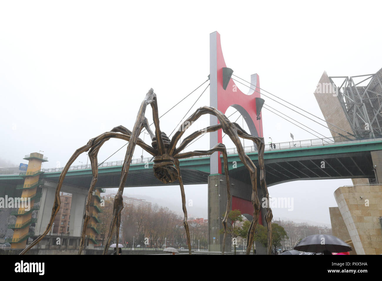 The Maman sculpture by Louise Bourgeois next to the Guggenheim Museum ...