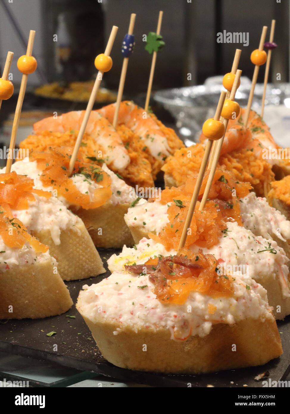 Assortment of tapas in the Shore Market (Mercado de la Ribera) in ...