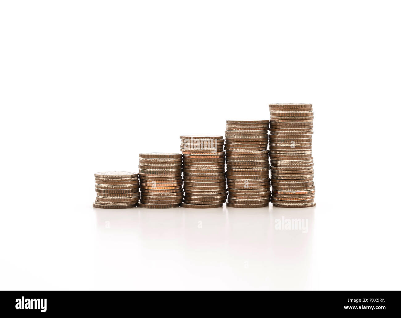 Coin stacks on a white background Stock Photo - Alamy