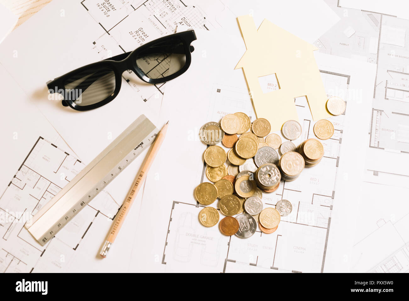 Composition of blueprints on table Stock Photo - Alamy