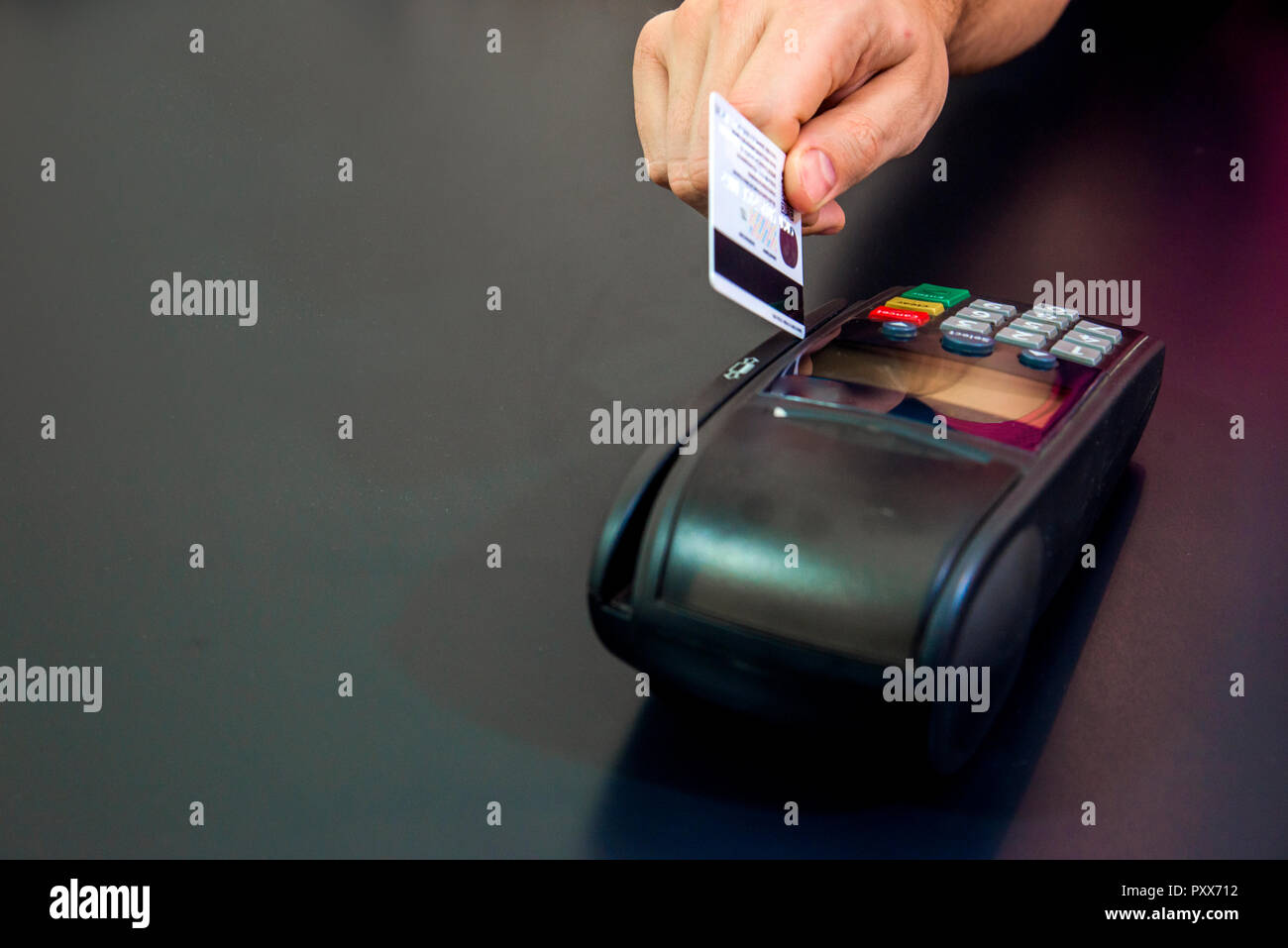 Female hand with credit card and bank terminal, Card machine or pos ...