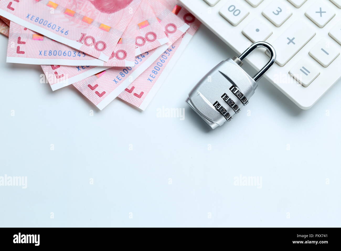 Financial security concept Password lock and banknotes on white ...