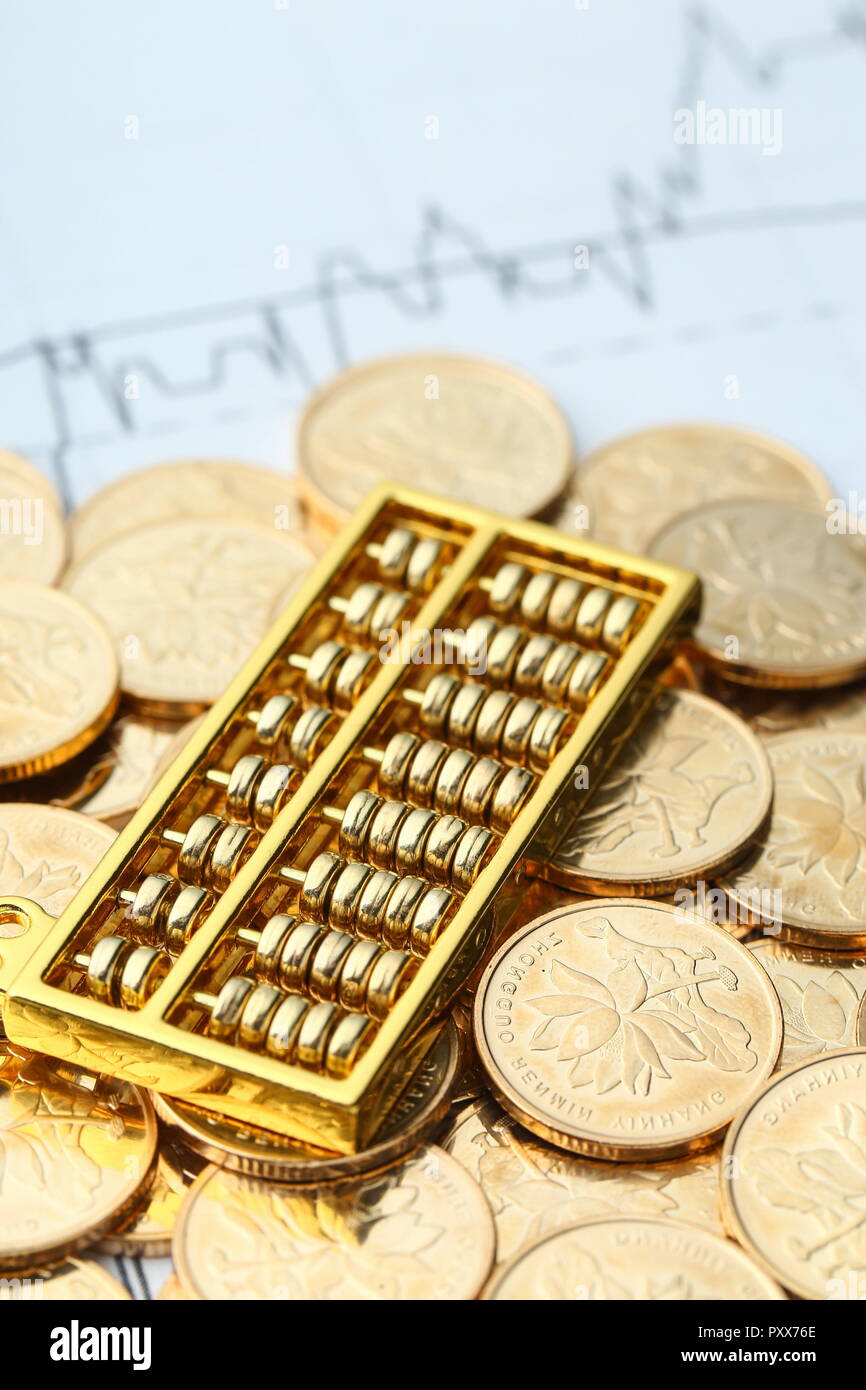 Golden coin and golden abacus hi-res stock photography and images - Alamy