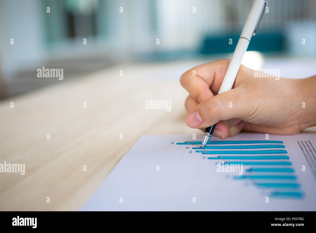 Hand write on Various financial charts on the table Stock Photo - Alamy