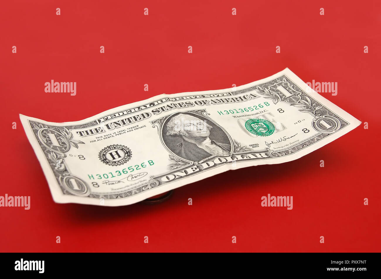 One Dollar Bill isolated on red Stock Photo - Alamy