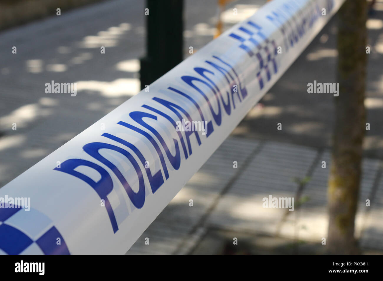 Blue and white police tape hi-res stock photography and images - Alamy