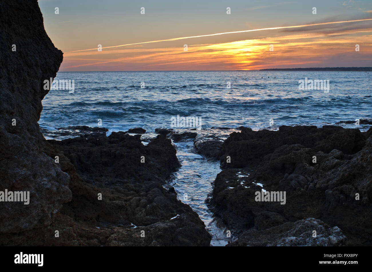 Sunset in Gale Beach, Albufeira. Coast of Algarve, Portugal Stock Photo ...