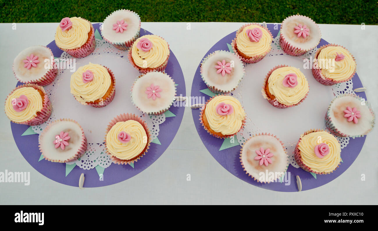 2 circular plates of cup cakes Stock Photo - Alamy
