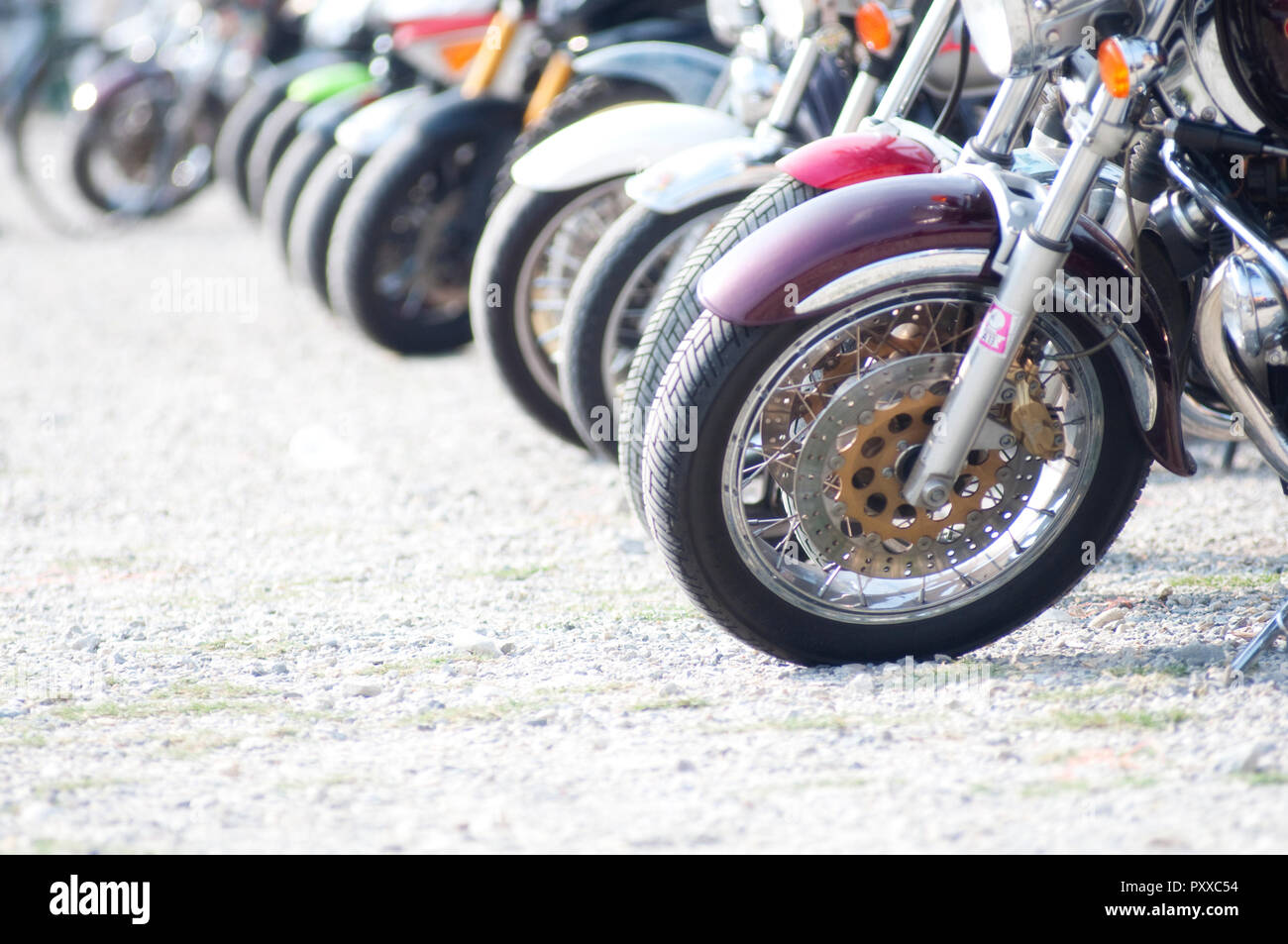 Motorbikes Parked in a Row Stock Photo - Alamy
