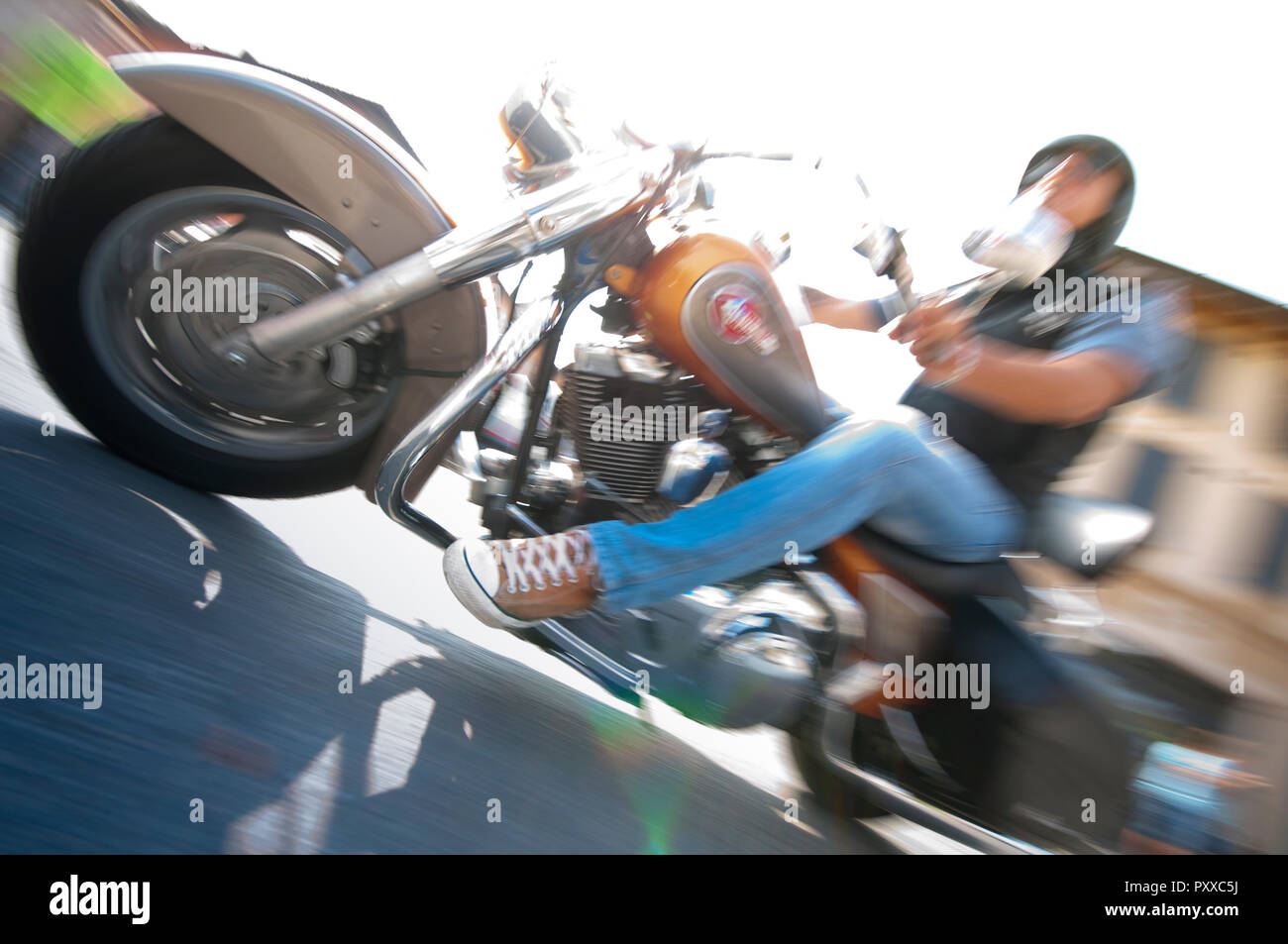 Harley Davidson Driver With His Motor Bike Stock Photo - Alamy