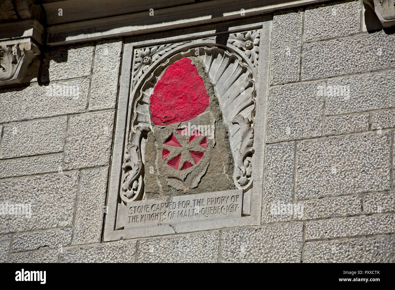 Knights of Malta Crest on Stone Building in Quebec City Stock Photo - Alamy