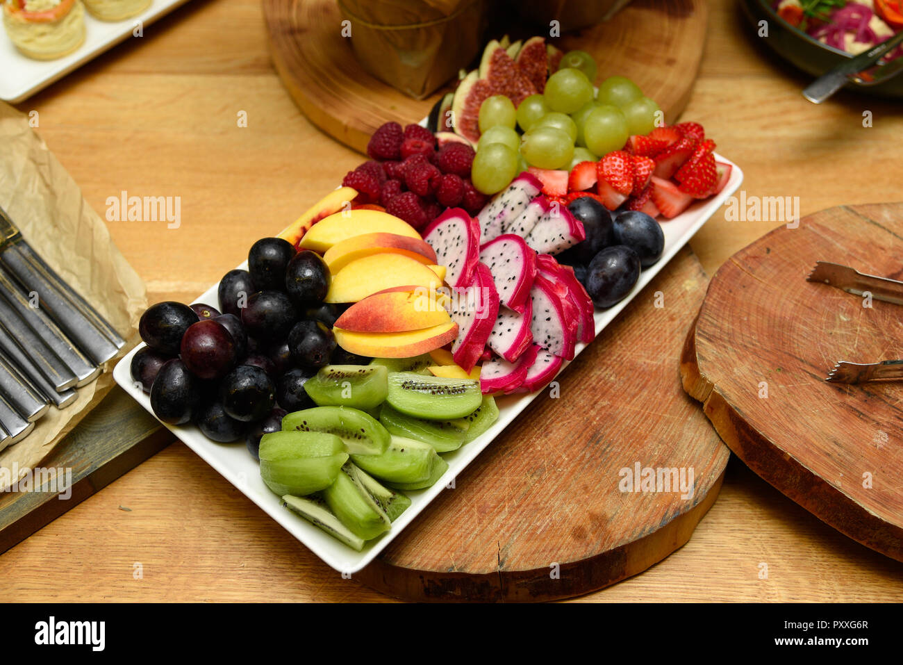 Party fruit plate with various fruits Stock Photo - Alamy