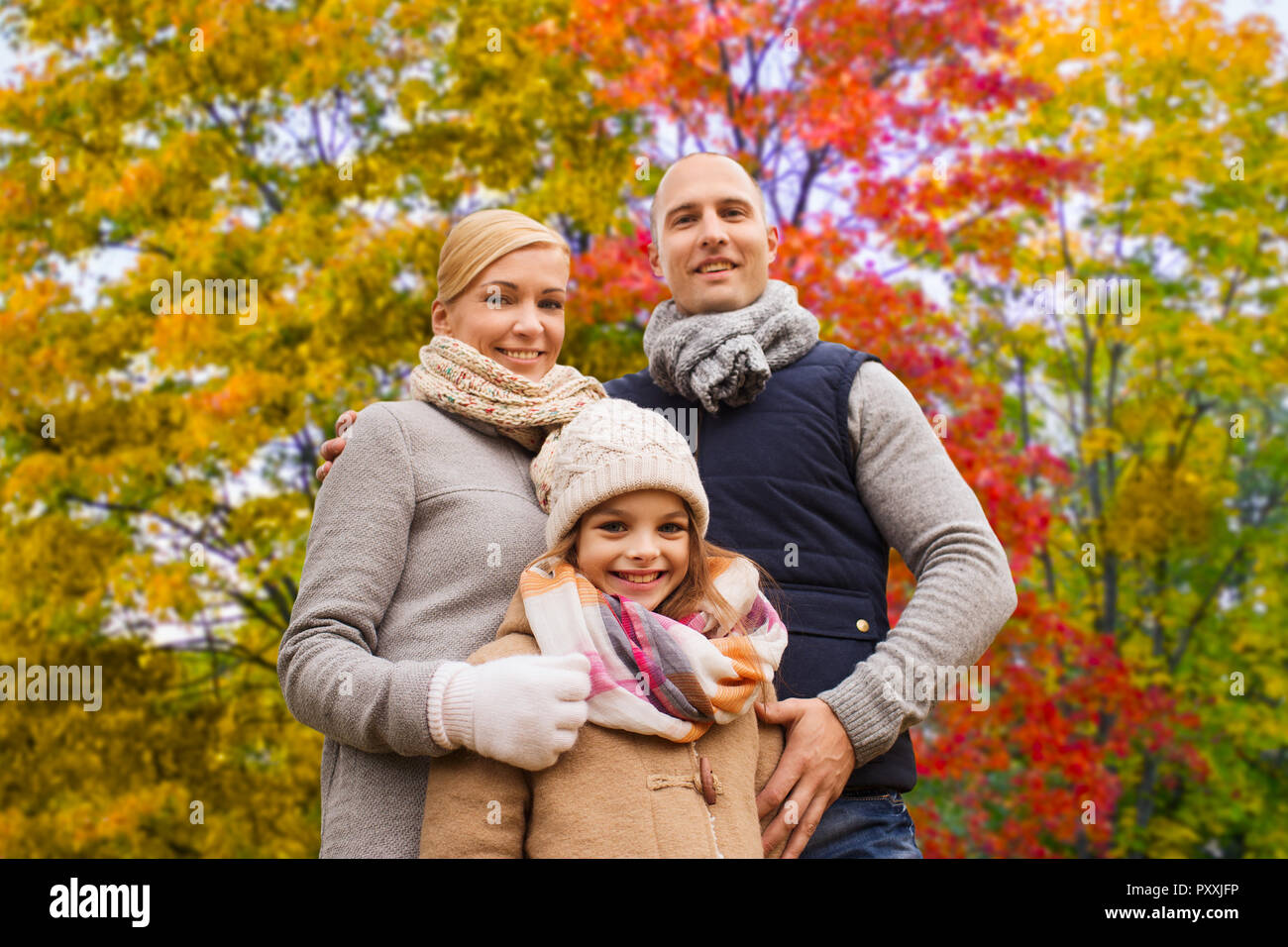 happy family over autumn park background Stock Photo - Alamy