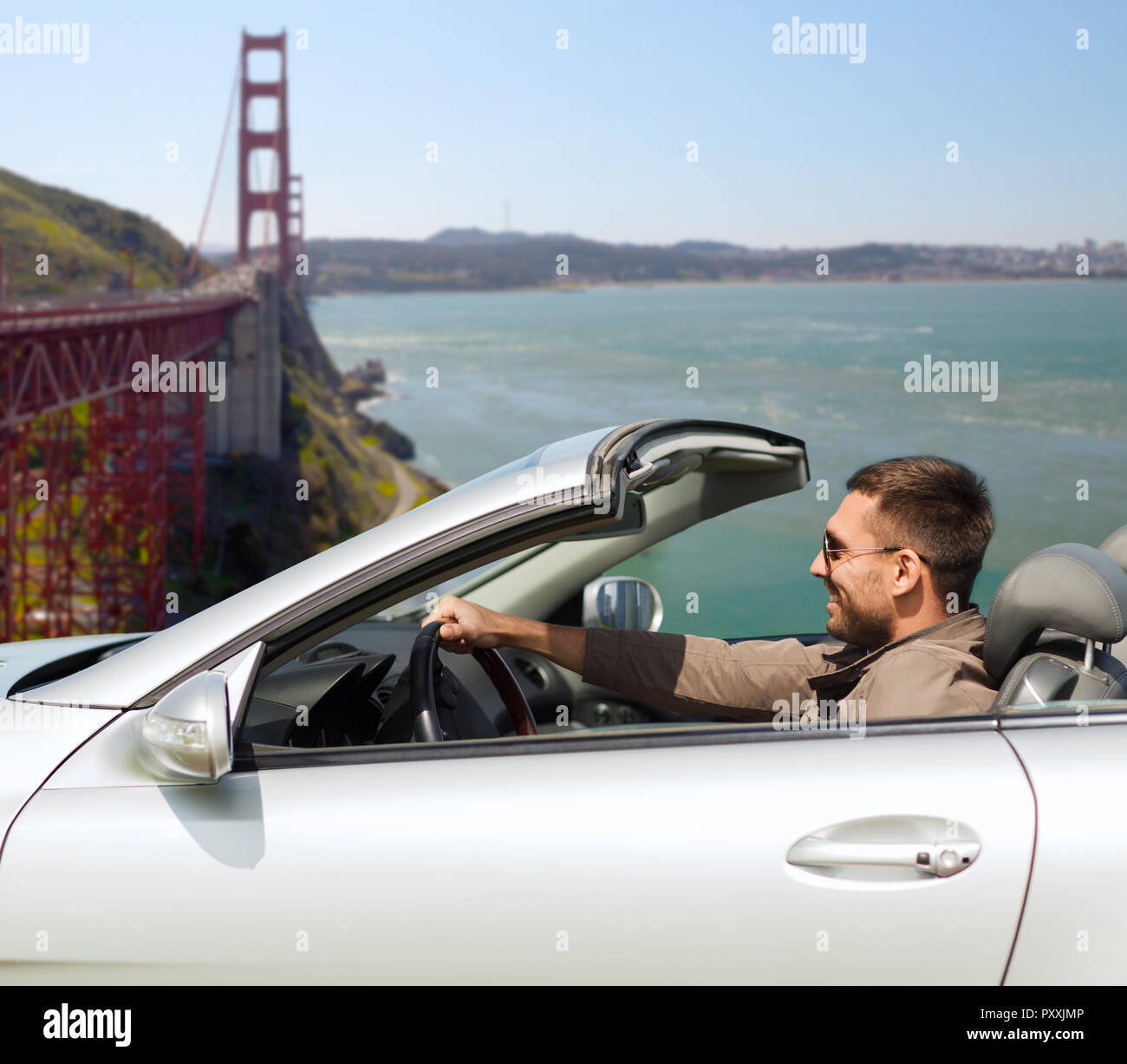 man driving car over golden gate bridge Stock Photo - Alamy