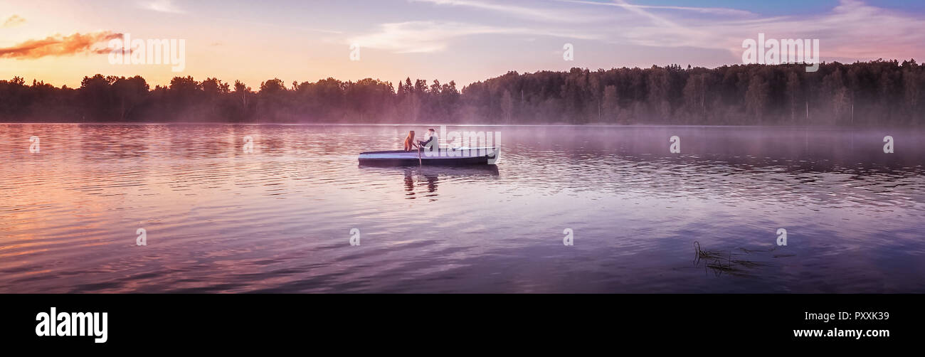 Romantic couple in rowing boat hi-res stock photography and images - Alamy