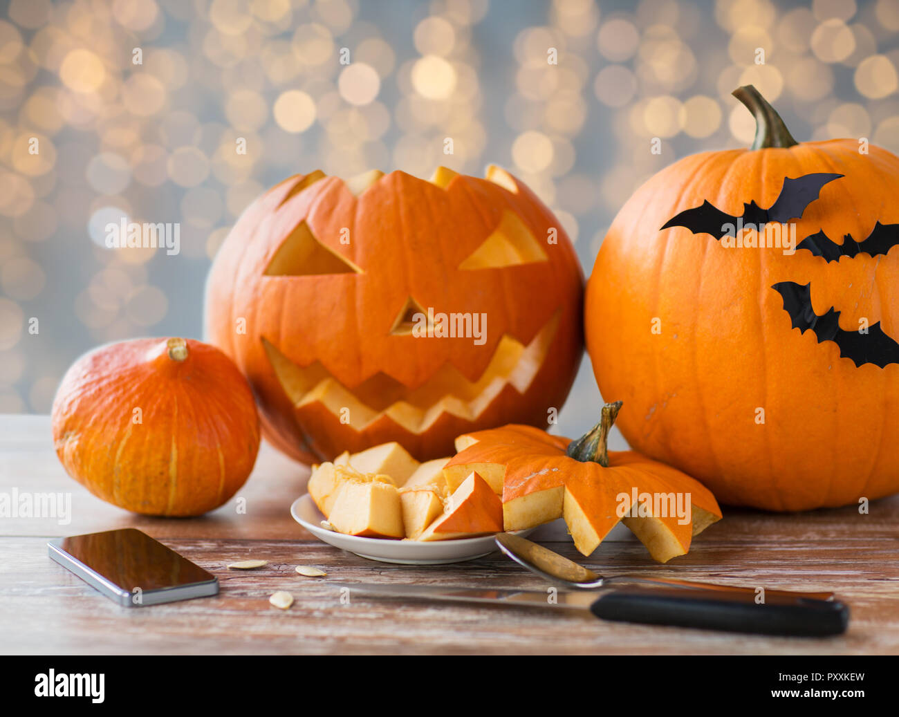 halloween jack-o-lantern, pumpkins and smartphone Stock Photo - Alamy