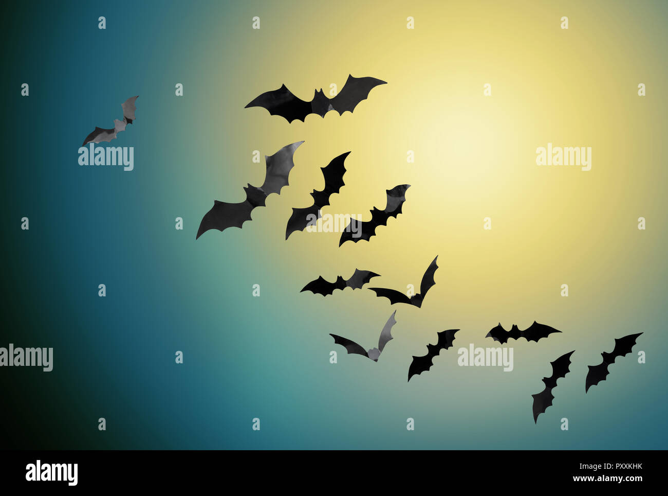 bats flying over moonlight in night sky background Stock Photo - Alamy