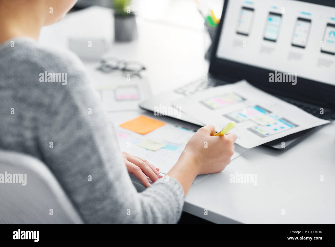 web designer working on user interface at office Stock Photo - Alamy