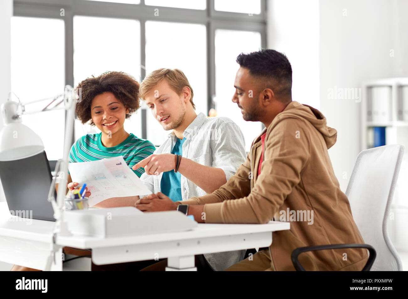 team working on user interface design at office Stock Photo - Alamy