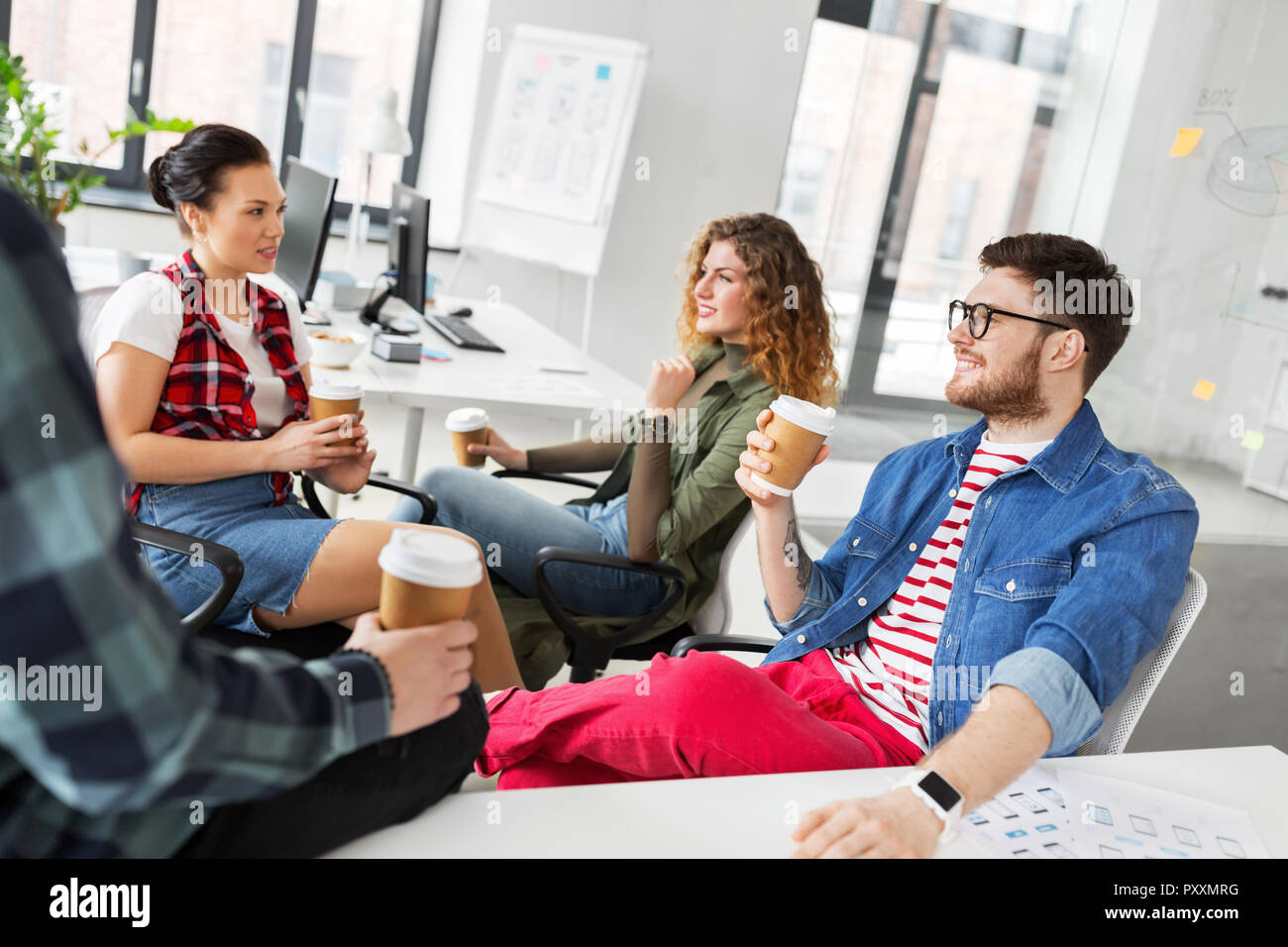 creative team drinking coffee at office Stock Photo - Alamy